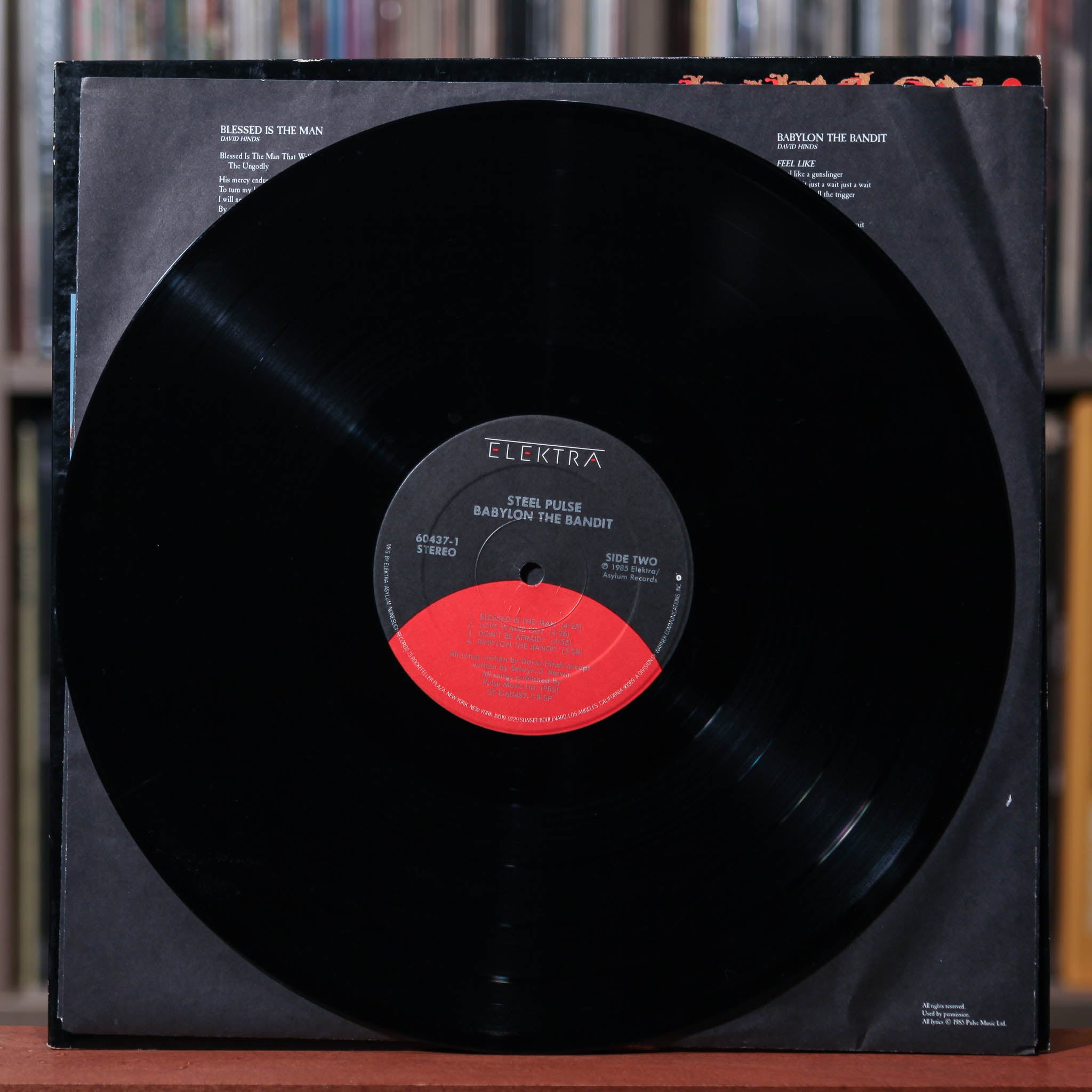 Steel Pulse - Babylon The Bandit - 1985 Elektra, EX/EX